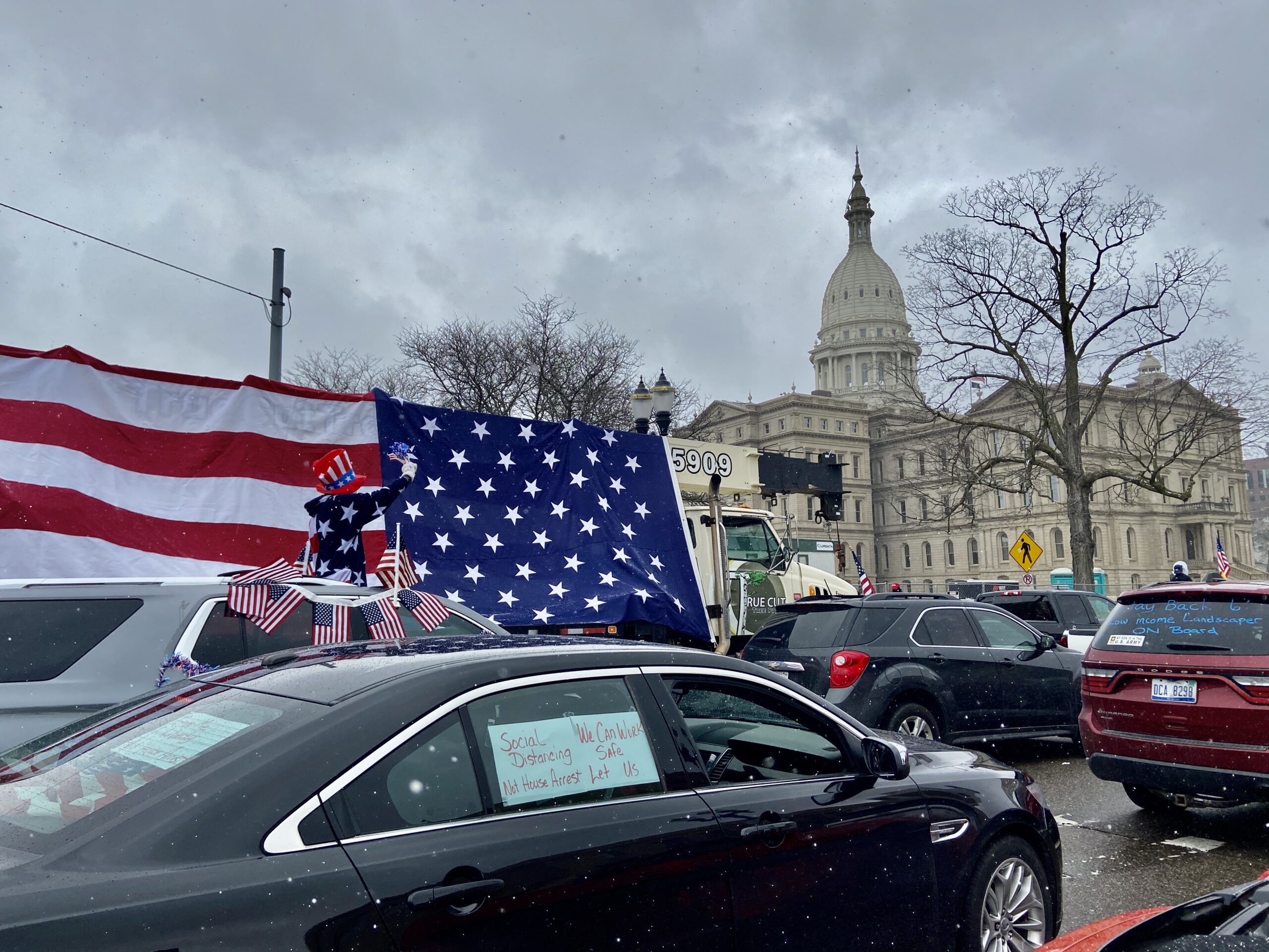 Protesters Descend on Michigan’s Capitol Demanding their Freedom to Work